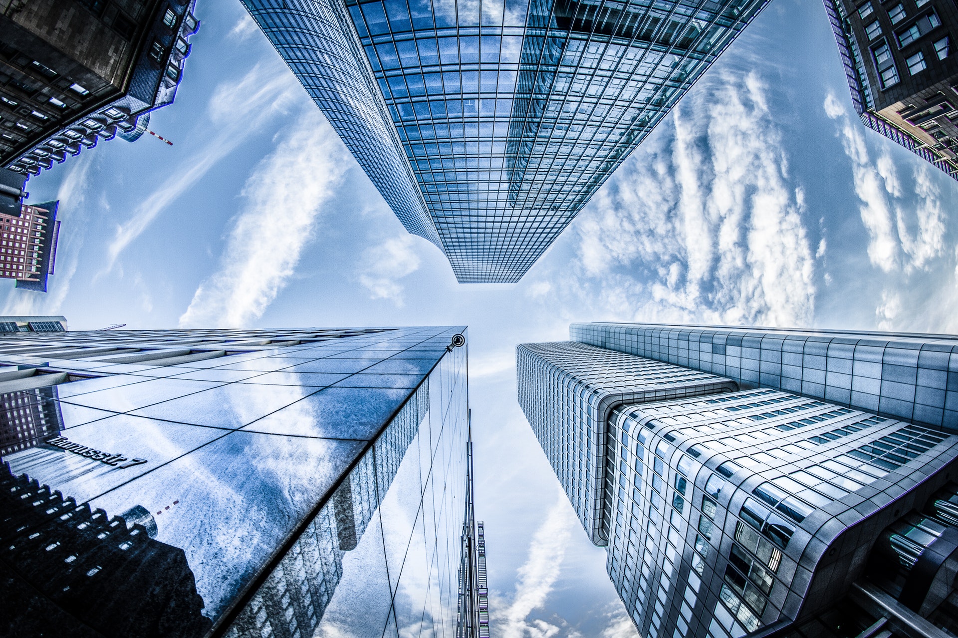 low-angle-photo-of-four-high-rise-curtain-wall-buildings-830891 ...
